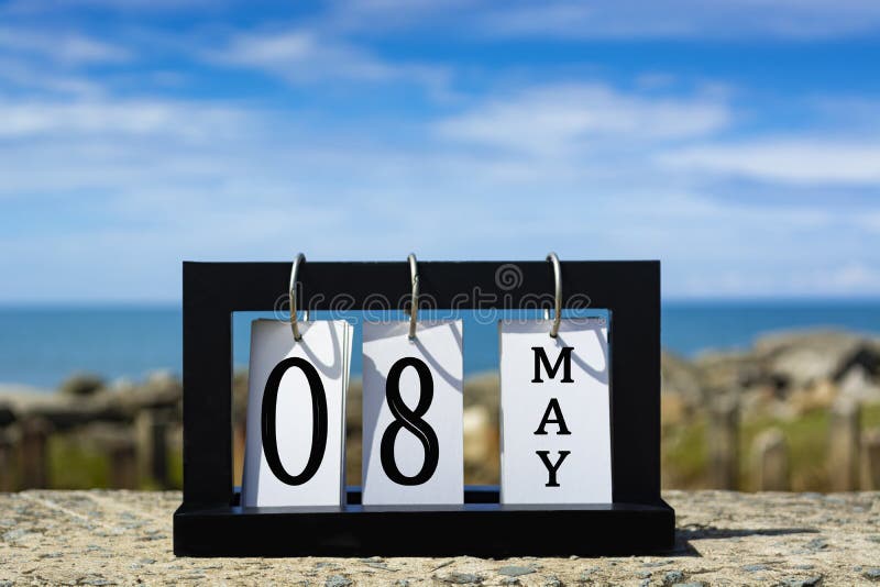 May 8 Calendar Date Text on Wooden Frame with Blurred Background of ...