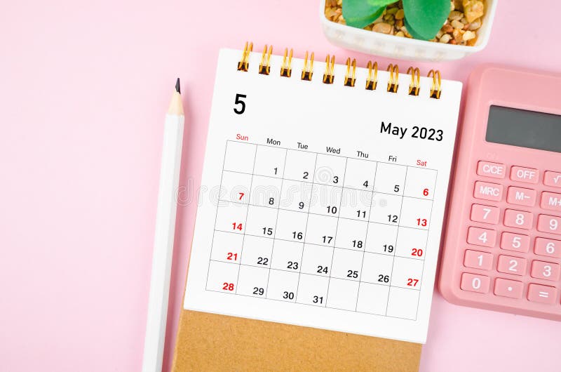 The May 2023 Desk Calendar for 2023 Year with Calculator on Pink Color ...
