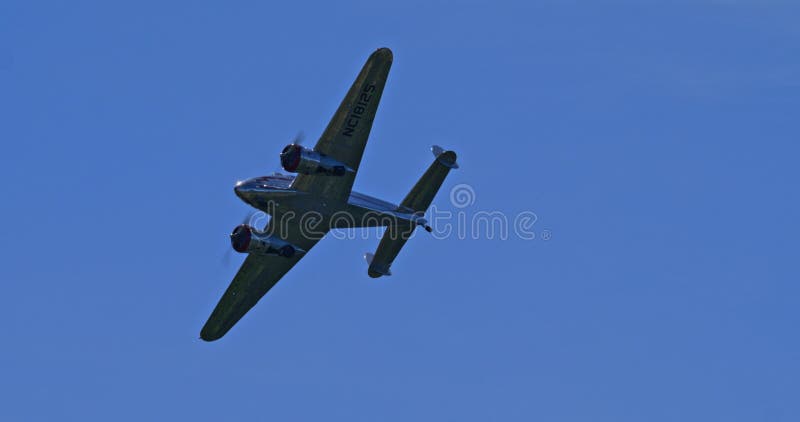 Vintage Lockheed L-12 Electra Junior in Dynamic Flight Overhead ...