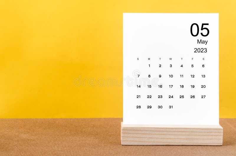 The May 2023 Monthly Calendar for 2023 Year on Yellow Table Stock Photo ...