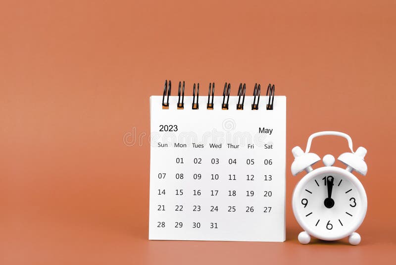 The May 2023 Monthly Desk Calendar for 2023 Year and Alarm Clock Stock ...
