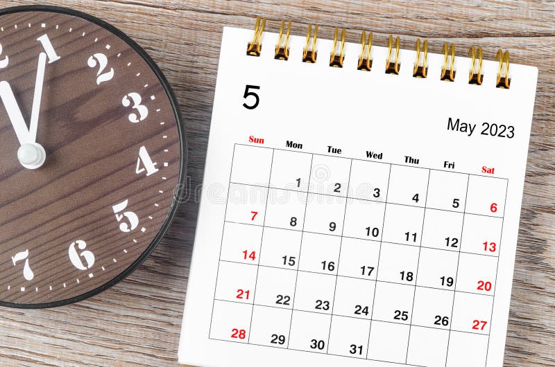 The May 2023 Monthly Desk Calendar for 2023 Year with Wooden Clock ...