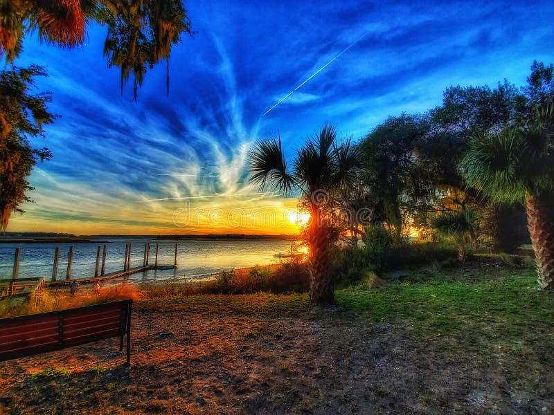 May River Sunset stock photo. Image of dusk, leaf, nature - 205578582