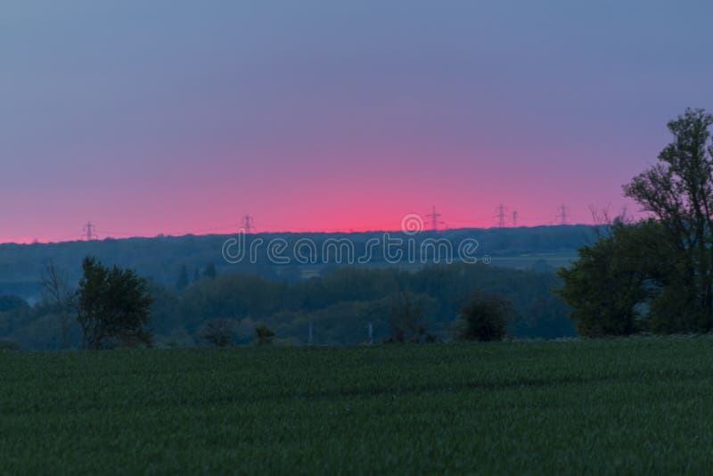 May Sunset Glow through the Clouds Stock Photo - Image of skies, clouds ...