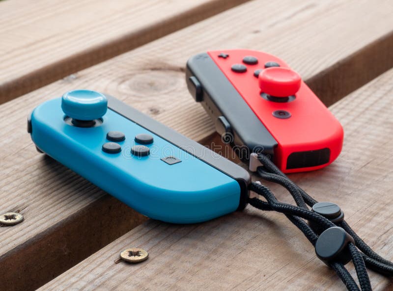 May 2020, UK: Nintendo Switch Joy Con Controllers Red and Blue Neon ...