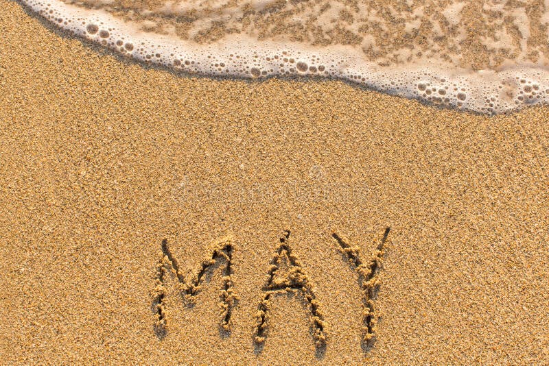 May - Word Drawn on the Sand Beach with the Soft Wave. Stock Image ...