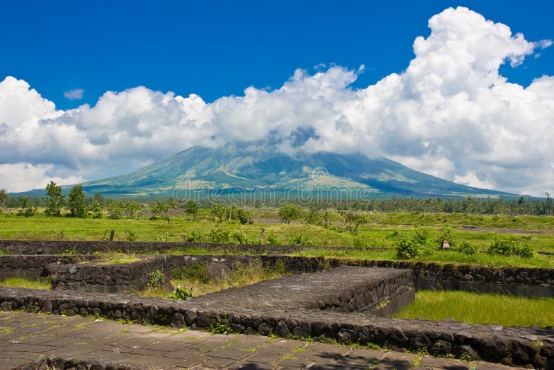 Mayon Volcano in clouds stock image. Image of landscape - 4734425