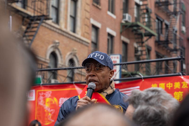 Mayor Eric Adams Standing on a Stage in Front of an Audience Engaging ...