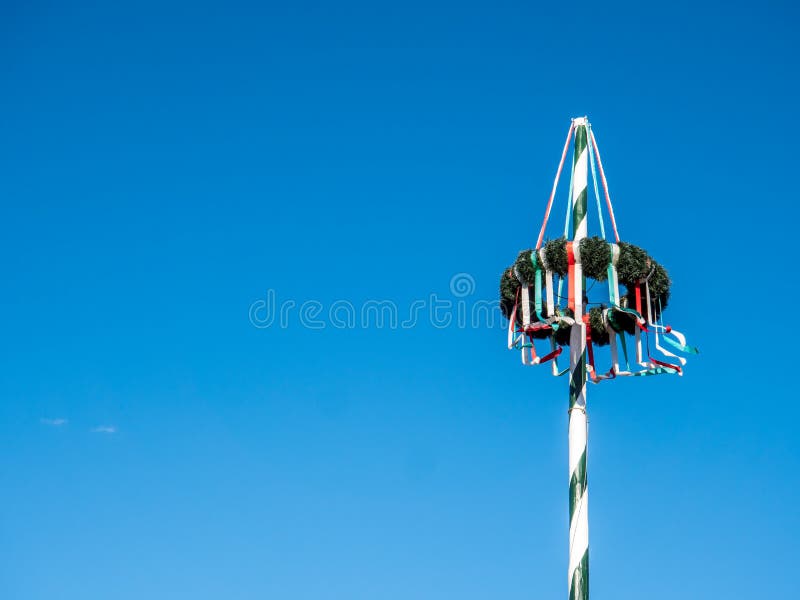 Maypole on Blue Background Image Stock Image - Image of sunlight ...