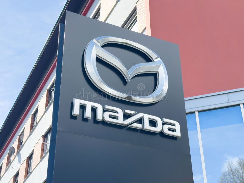 Mazda Logo on Building Exterior Against Clear Sky Editorial Photography ...
