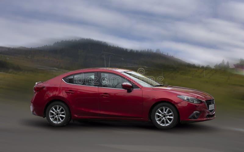Mazda red car. stock photo. Image of movement, blurred - 270753632