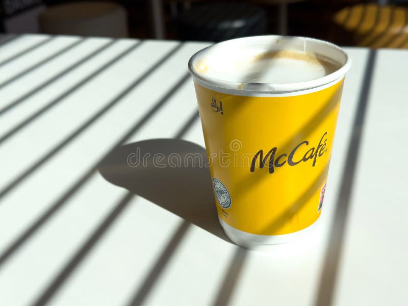 Mccafe Coffee Cup in Sunlit Cafe Setting Editorial Photography - Image ...