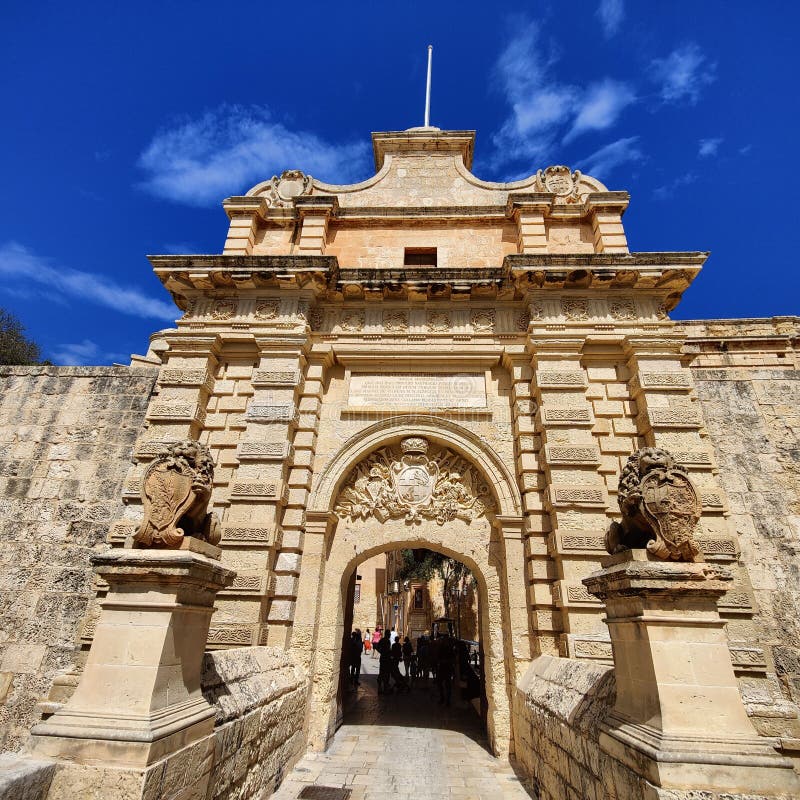 Mdina Gate with a Cloudy Blue Sky in the Background in Mdina, Malta ...