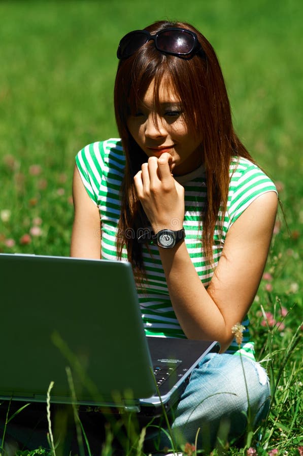 Girl with laptop on couch stock photo. Image of lifestyle - 5604292