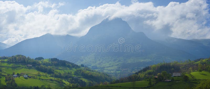 Meadows in Goierri and Txindoki Mountain between Clouds, Euskadi Stock ...