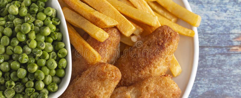 A Meal of Beer Battered Fish Chips and Peas Stock Image - Image of ...