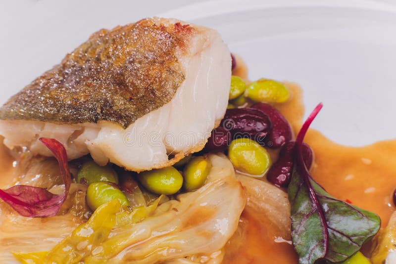 Meal of Boiled Cod Fish with Black Olives and Green Beans. Stock Photo ...