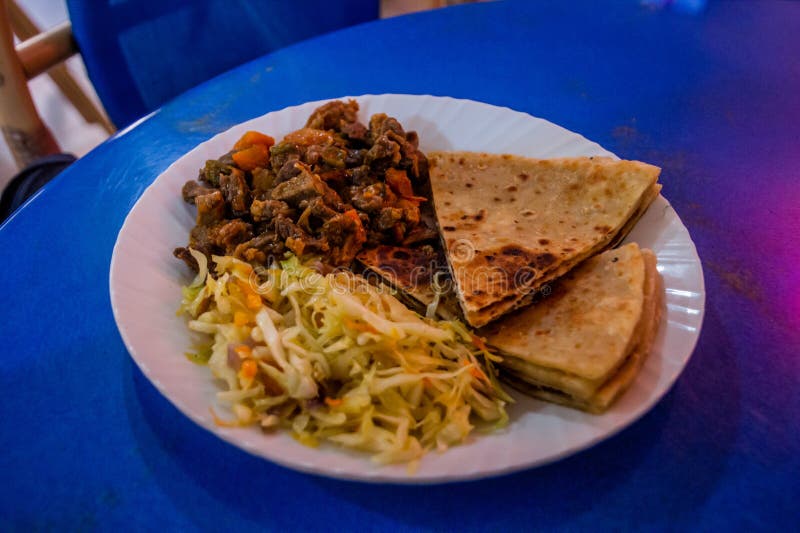 Meal in Kenya - Beef Stew with Cabbage and Chapa Stock Photo - Image of ...