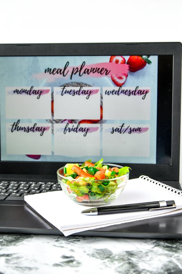 A Meal Plan for a Week. Bowl with Vegetable Salad in the Workplace Near ...
