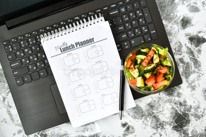 A Meal Plan for a Week. Bowl with Vegetable Salad in the Workplace Near ...