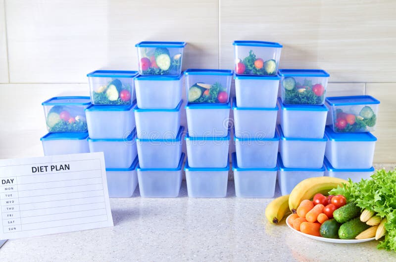 A Meal Plan for a Week on a White Table among Set of Plastic Containers ...