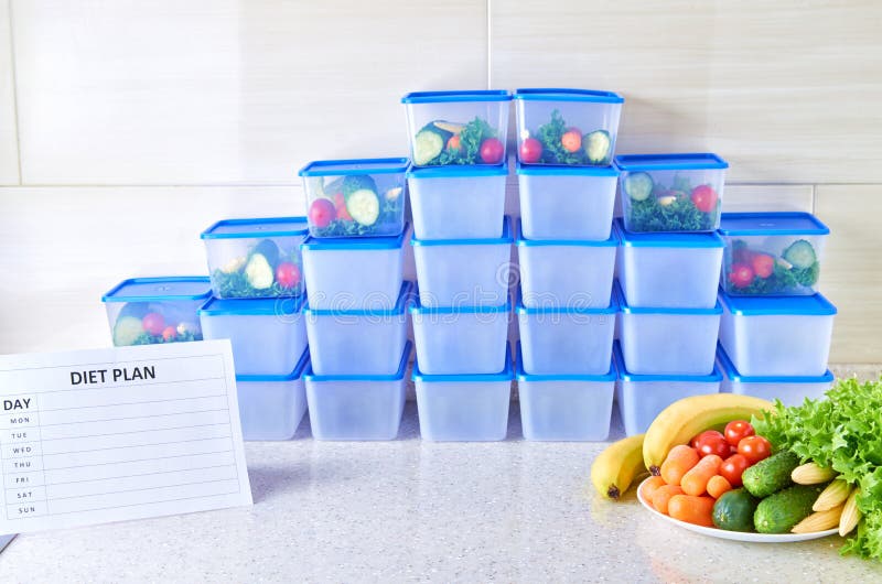 A Meal Plan for a Week on a White Table among Set of Plastic Containers ...