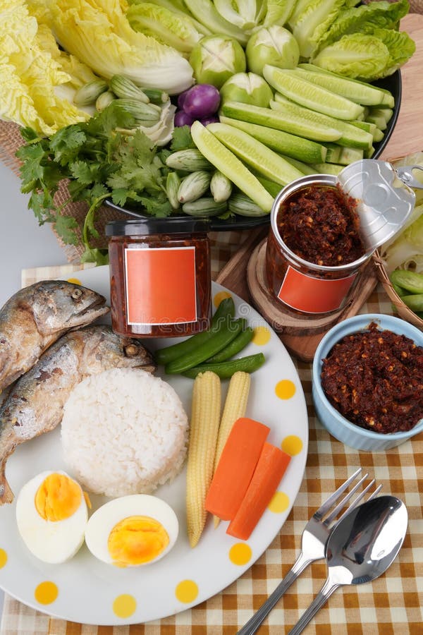 A Meal Setup Featuring a Cup of Thai Chili Paste, a Plate with Two ...