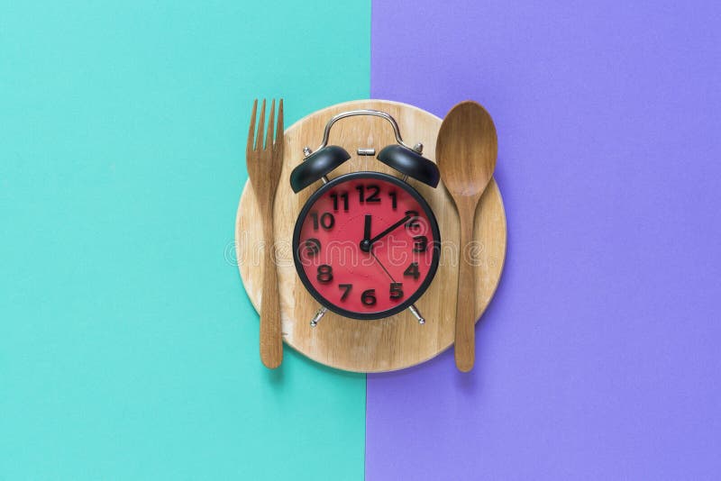 Meal Time with Alarm Clock at Lunch Time Stock Photo - Image of fork ...
