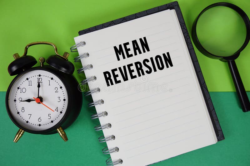 Mean Reversion Text Written on Notebook Paper with Alarm Clock and ...