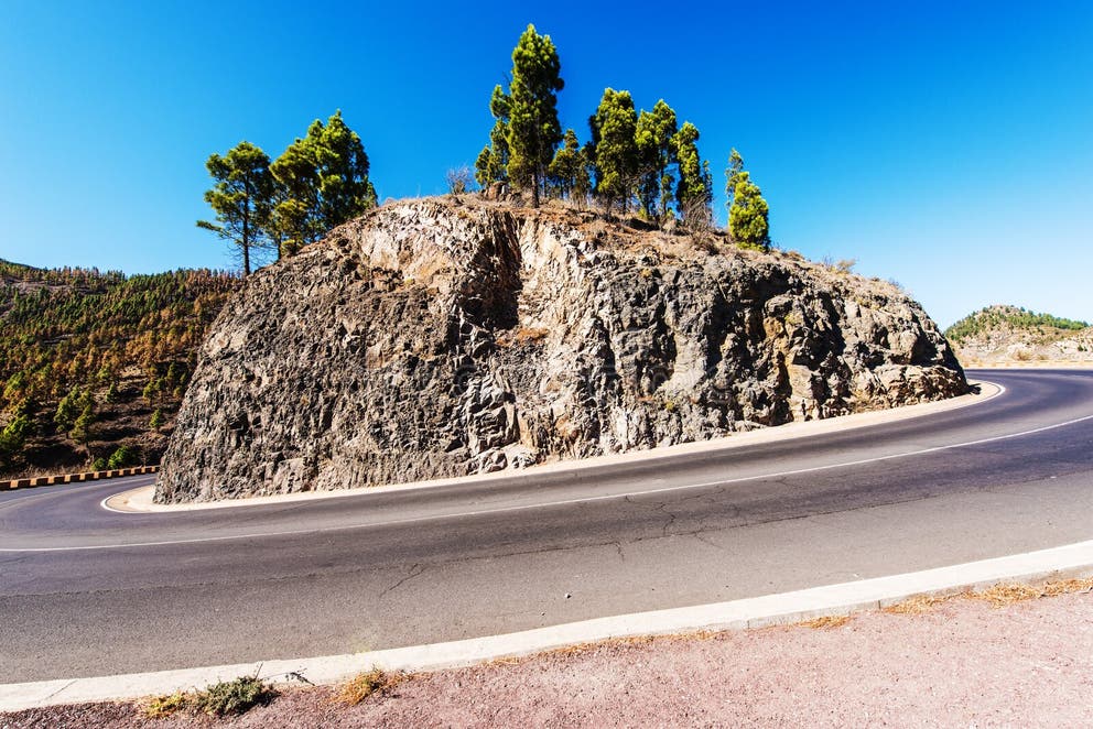 Meandering Path Around a Cliff Stock Photo - Image of path, asphalt ...