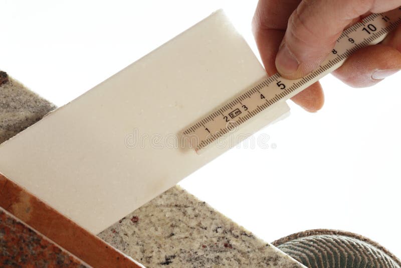 Measure in hand stock image. Image of building, measure - 27268593