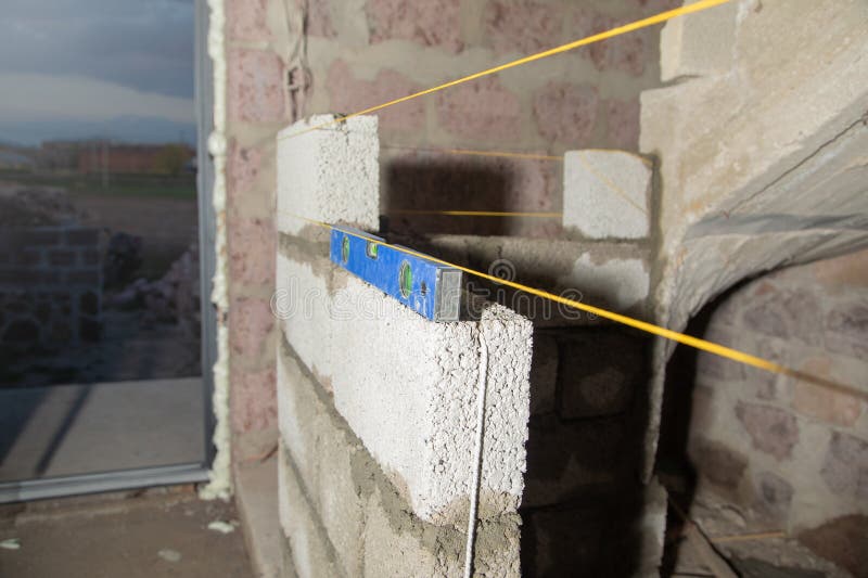 Measure Level on Brick Wall in Construction Site Stock Image - Image of ...
