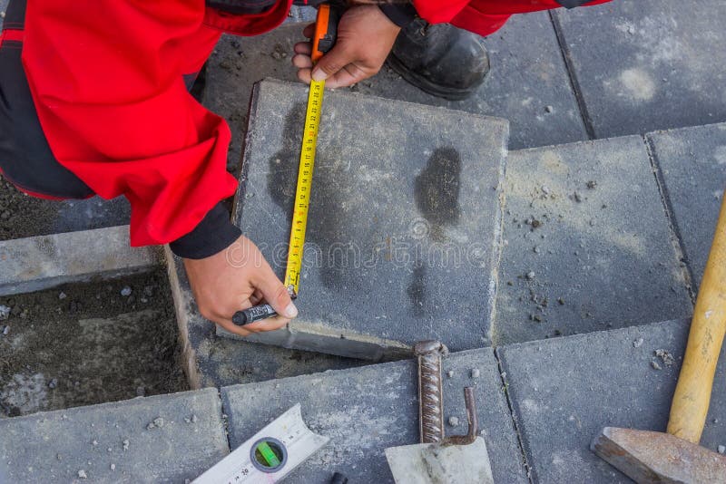 Measure and Marking Pavement Stone before Cutting Stock Image - Image ...