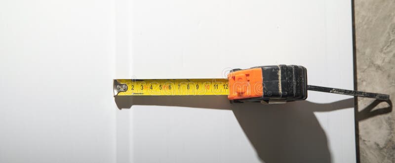 Measure Tape on Ceiling Plastic Panel Stock Image - Image of plank ...