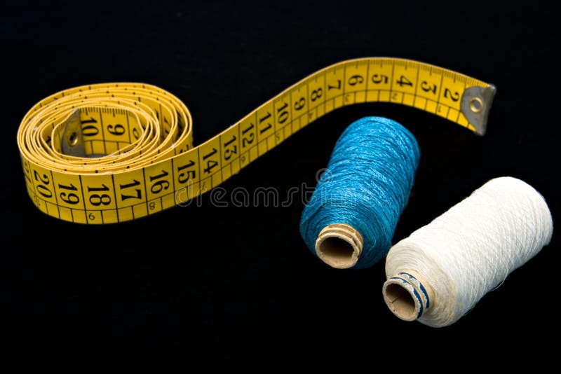 Measure Tape and Thread Bobins Stock Image - Image of measure, thread ...