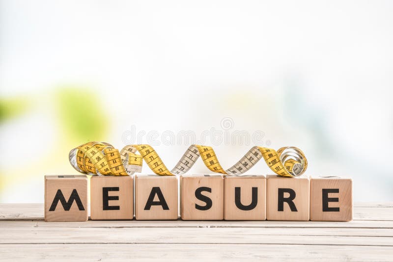 Measure Word on a Wooden Table Stock Photo - Image of accessory ...