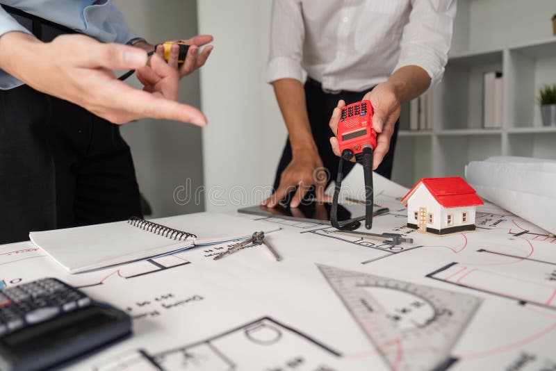 Measurement and Precision in Architecture. Professionals Discussing ...