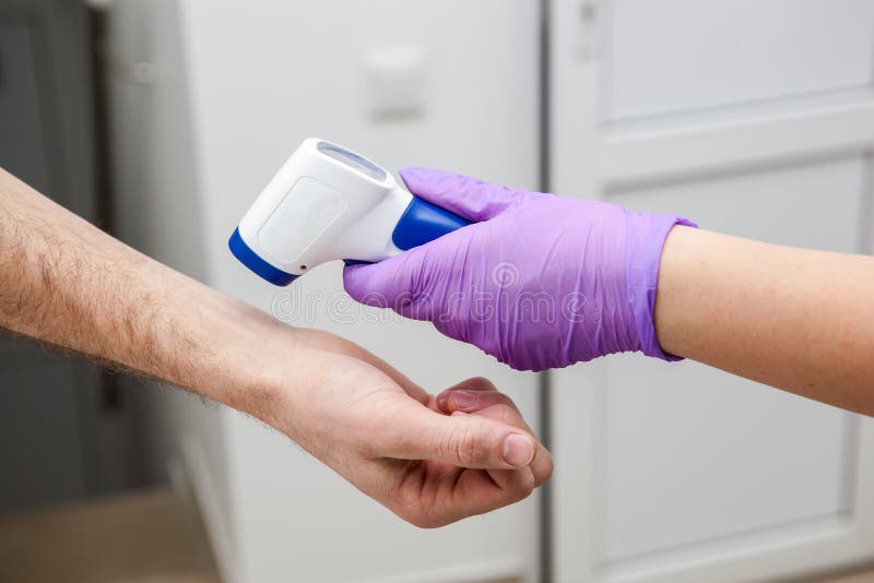 Measures the Temperature of the Hand Remotely Stock Image - Image of ...