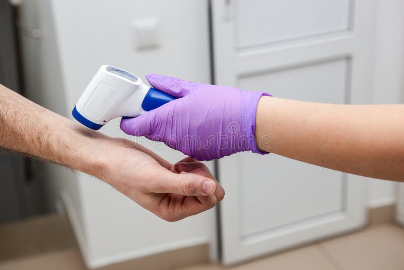 Measures the Temperature of the Hand Remotely Stock Image - Image of ...