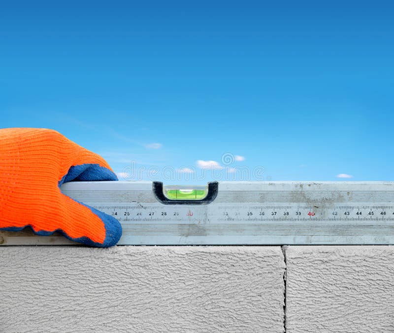 Measures the Wall with a Spirit Level Stock Image - Image of work ...