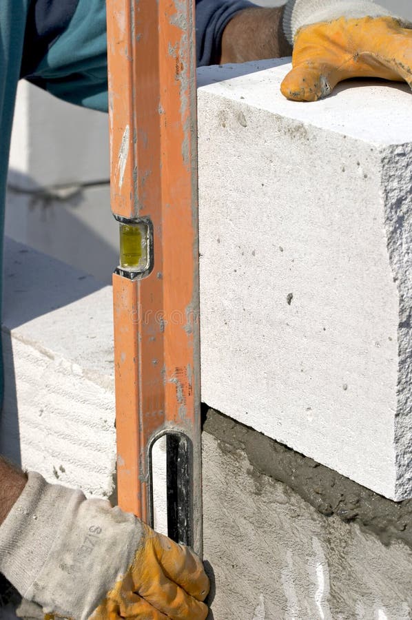 Worker Aligning Some Bricks that Will for a Wall Stock Image - Image of ...