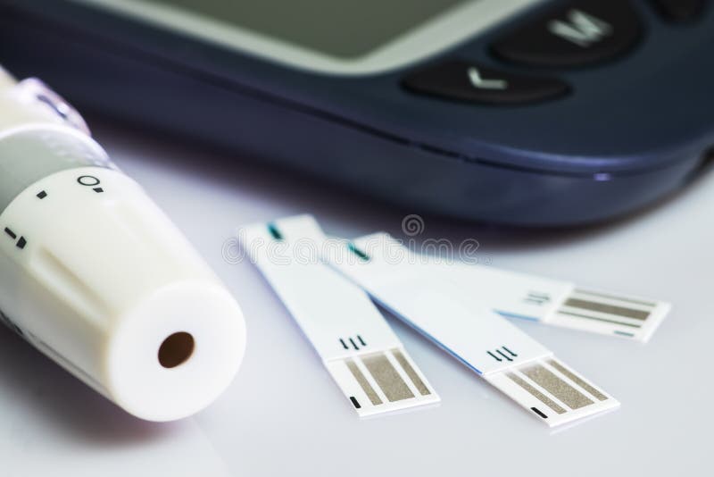 Measuring Blood Sugar. Glucometer with Insulin Pen on a White ...