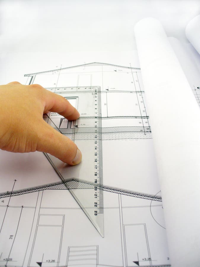 Measuring on blueprints stock image. Image of designing - 1064257