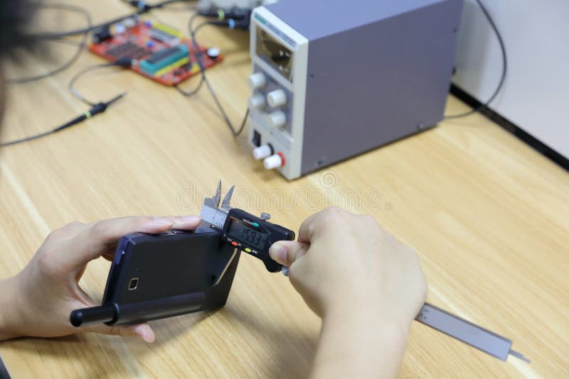 Caliper Measuring a Tool with a Caliper Stock Image - Image of engineer ...