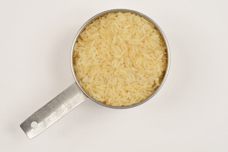 Measuring Cup Filled with Rice Stock Image - Image of topdown, food ...