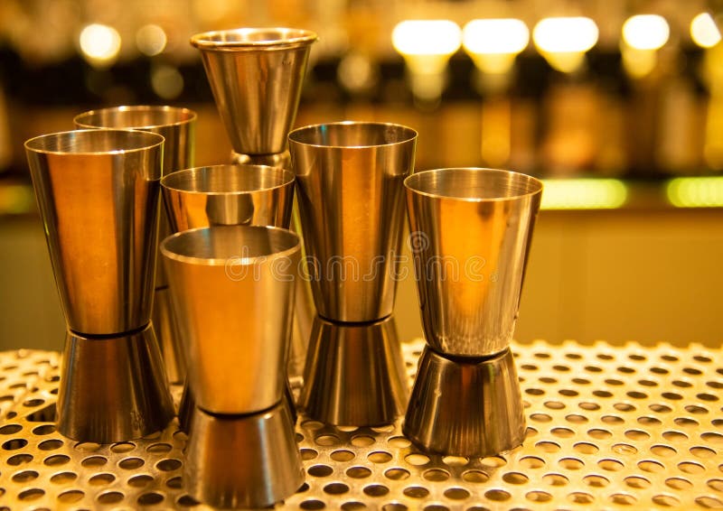 Measuring Cups on a Bar Counter Stock Image - Image of nightlife ...