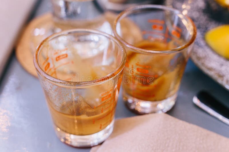 Measuring Cups with Strained of Coffee Stock Image - Image of container ...
