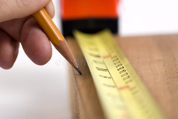 Measuring for the Cut (shallow DOF) Stock Photo - Image of builder ...