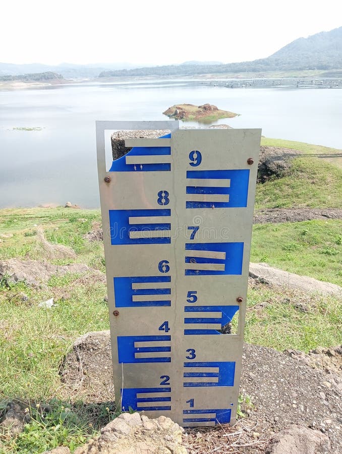 Measuring the Depth of Water in the Dam Stock Photo - Image of depth ...