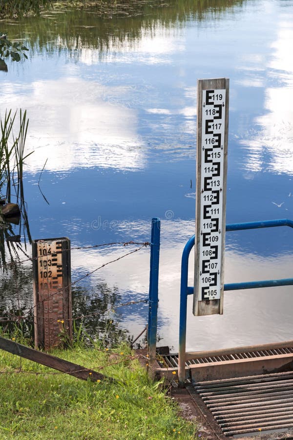 Measuring the Depth of Water Stock Image - Image of fishing, morass ...